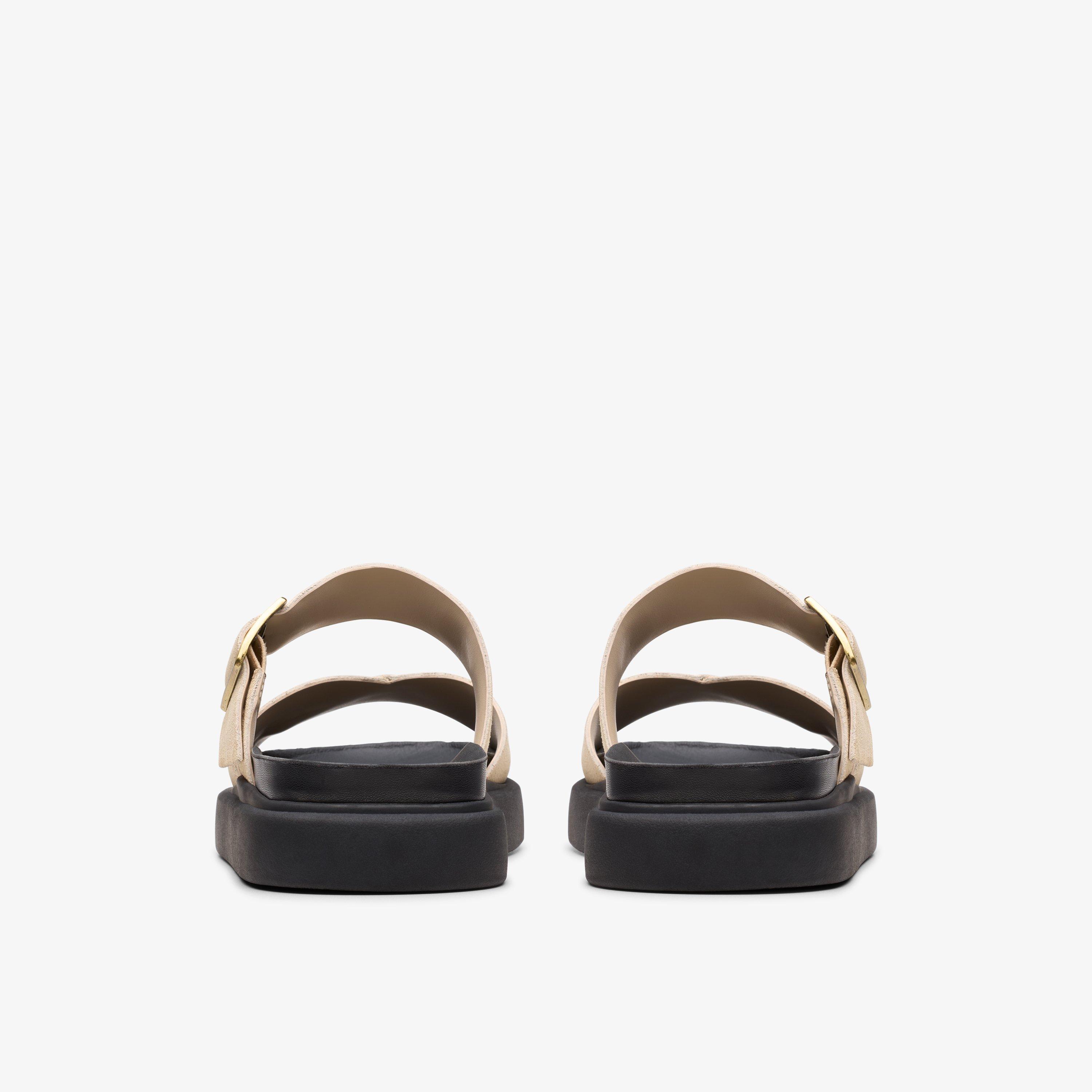 Mules Aristella Mule en daim écru pour femmes Sandales plates à enfiler ...