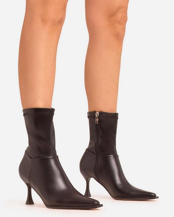 Casa Pointed Toe Low Heel Ankle Sock Boot In Black Faux Leather