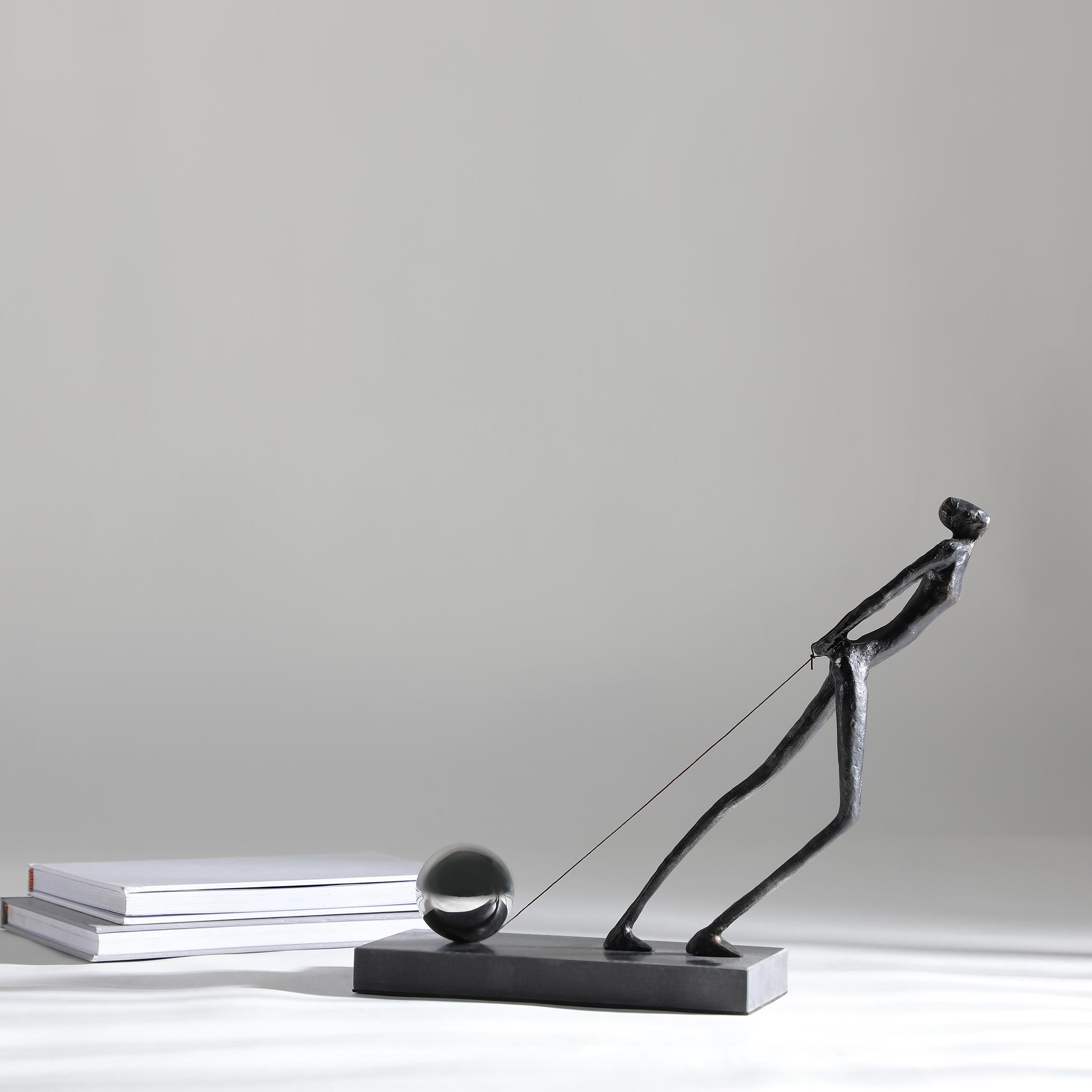 Shop Man Pulling Ball Decorative Figurine Online | Home Centre UAE