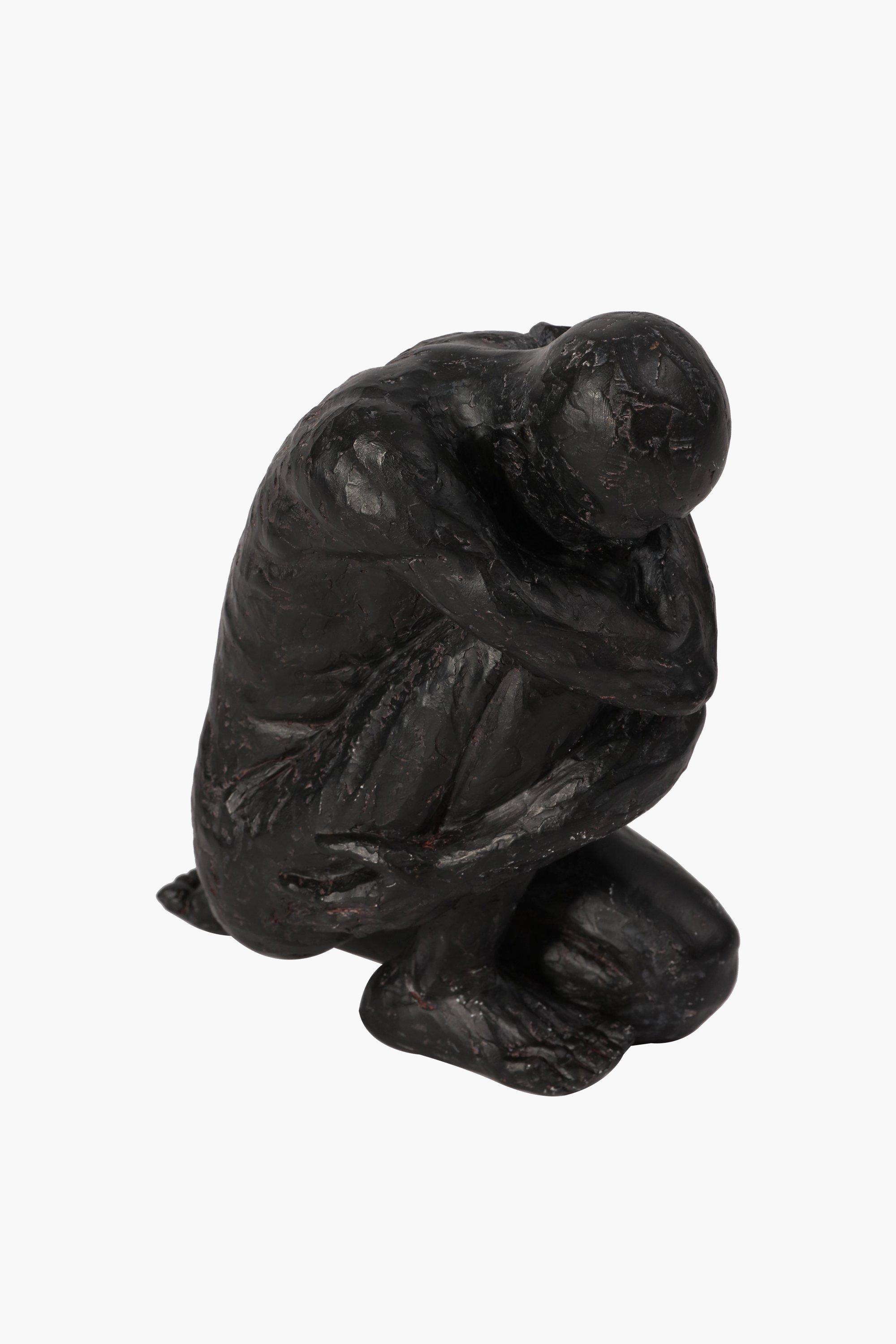 Crouching Man Statue