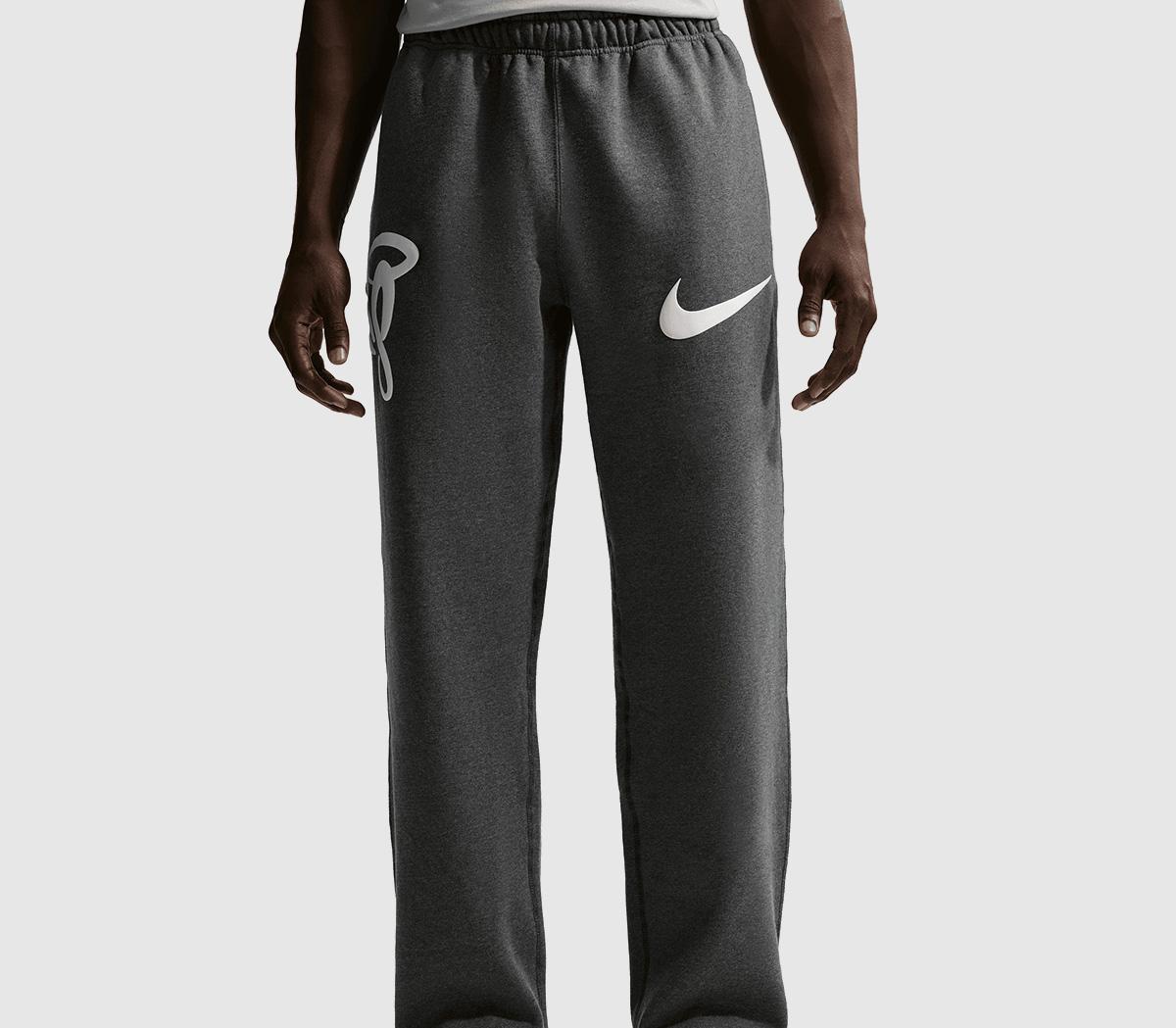Click here for Nike Mens Central Cee Syna World Fleece Pant Charc... prices
