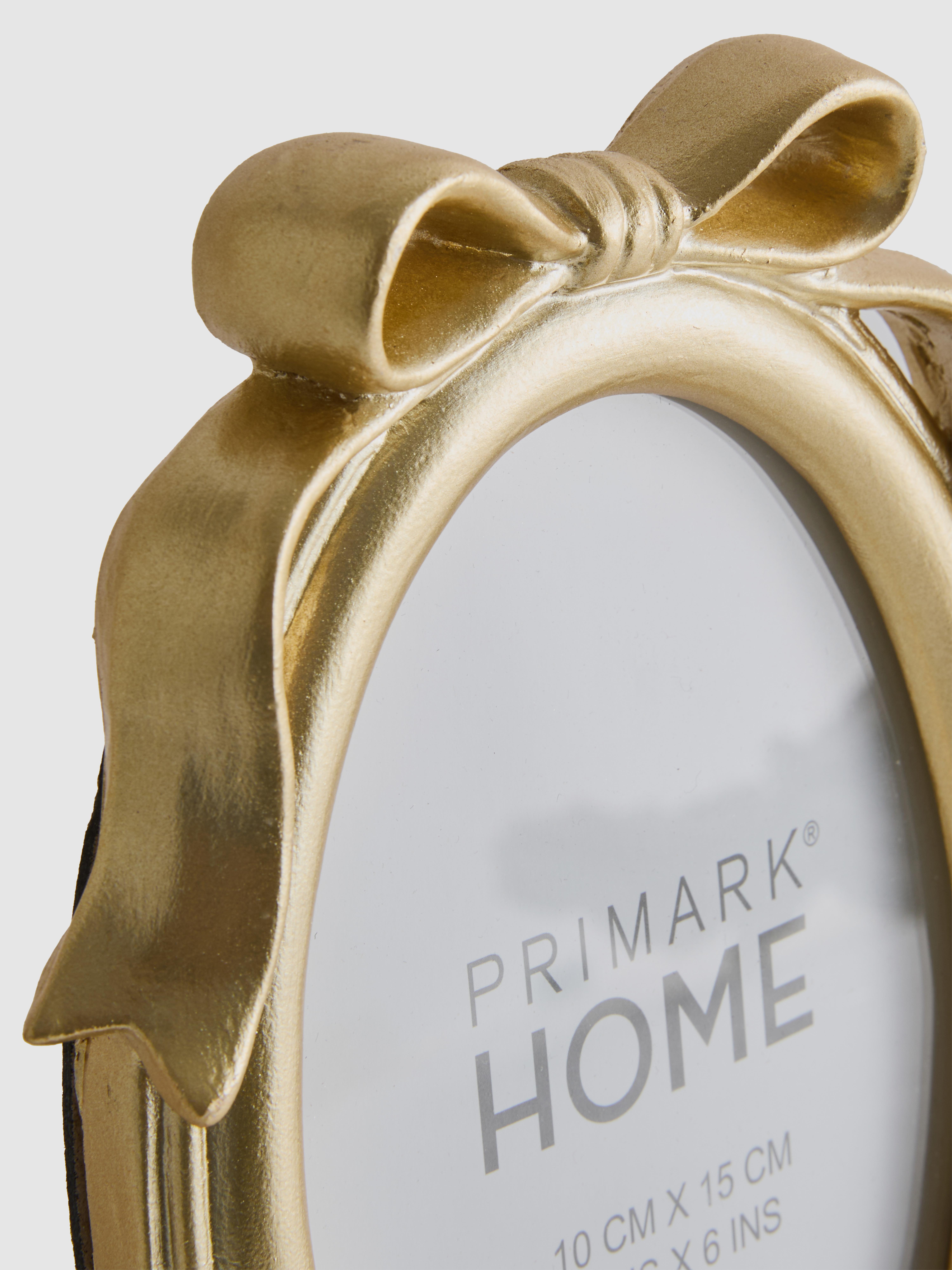 Gold Metallic Bow Photo Frame 10x15cm (4x6in) | Penneys