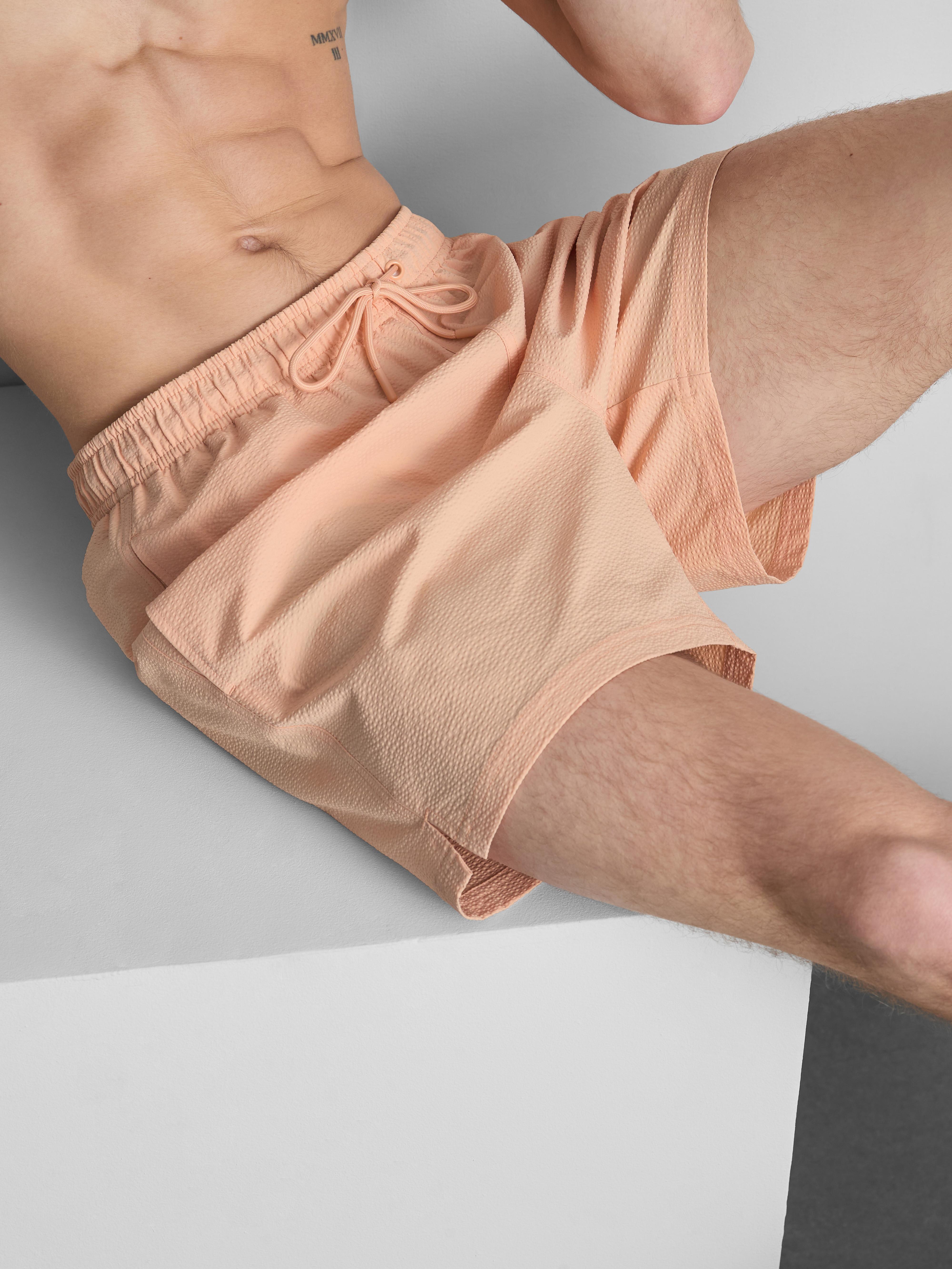 Mens Orange Textured Swimming Shorts | Primark