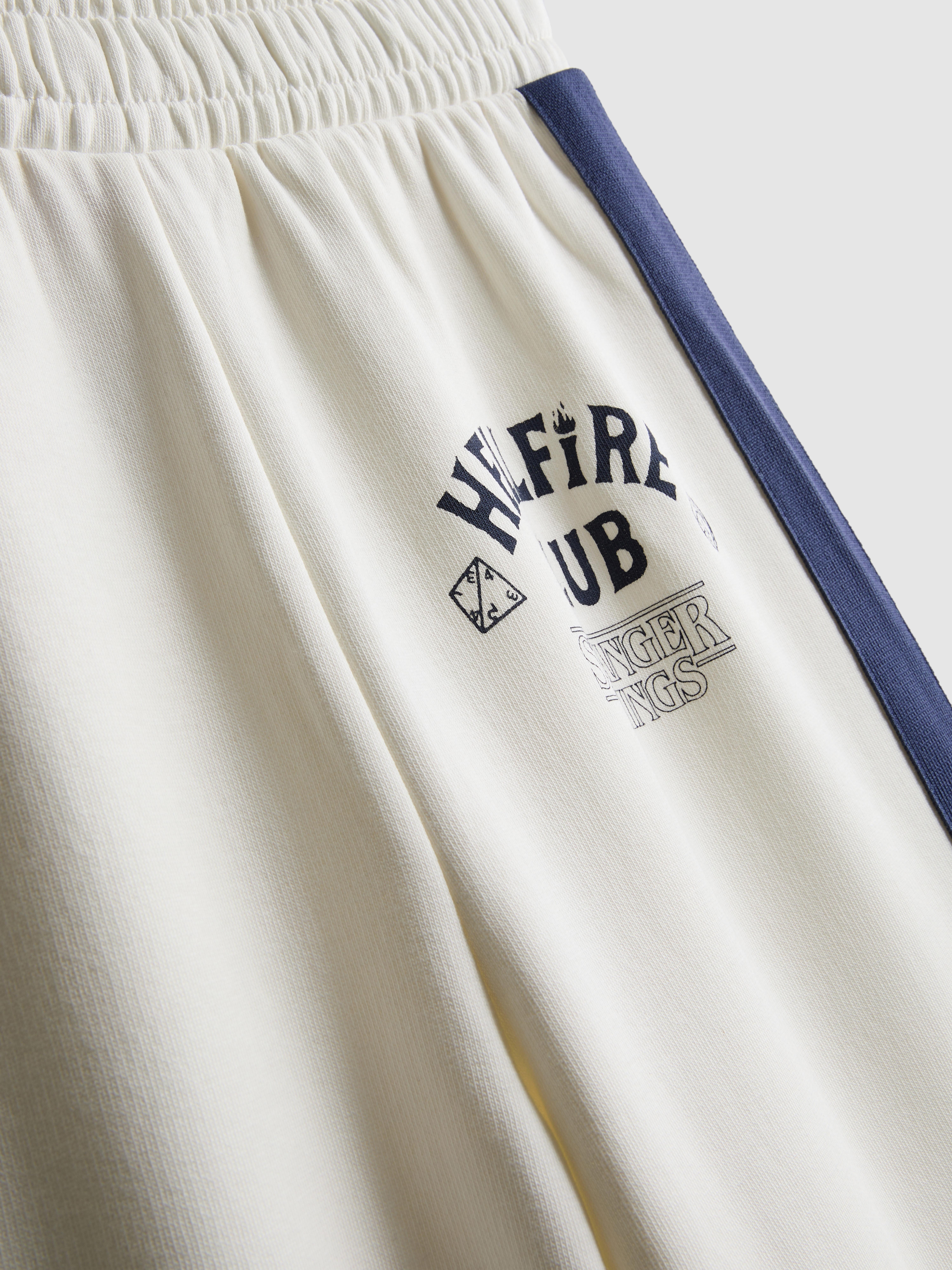 7-15 anni | Pantaloni tuta a righe Stranger Things - Avorio - Bambina ...