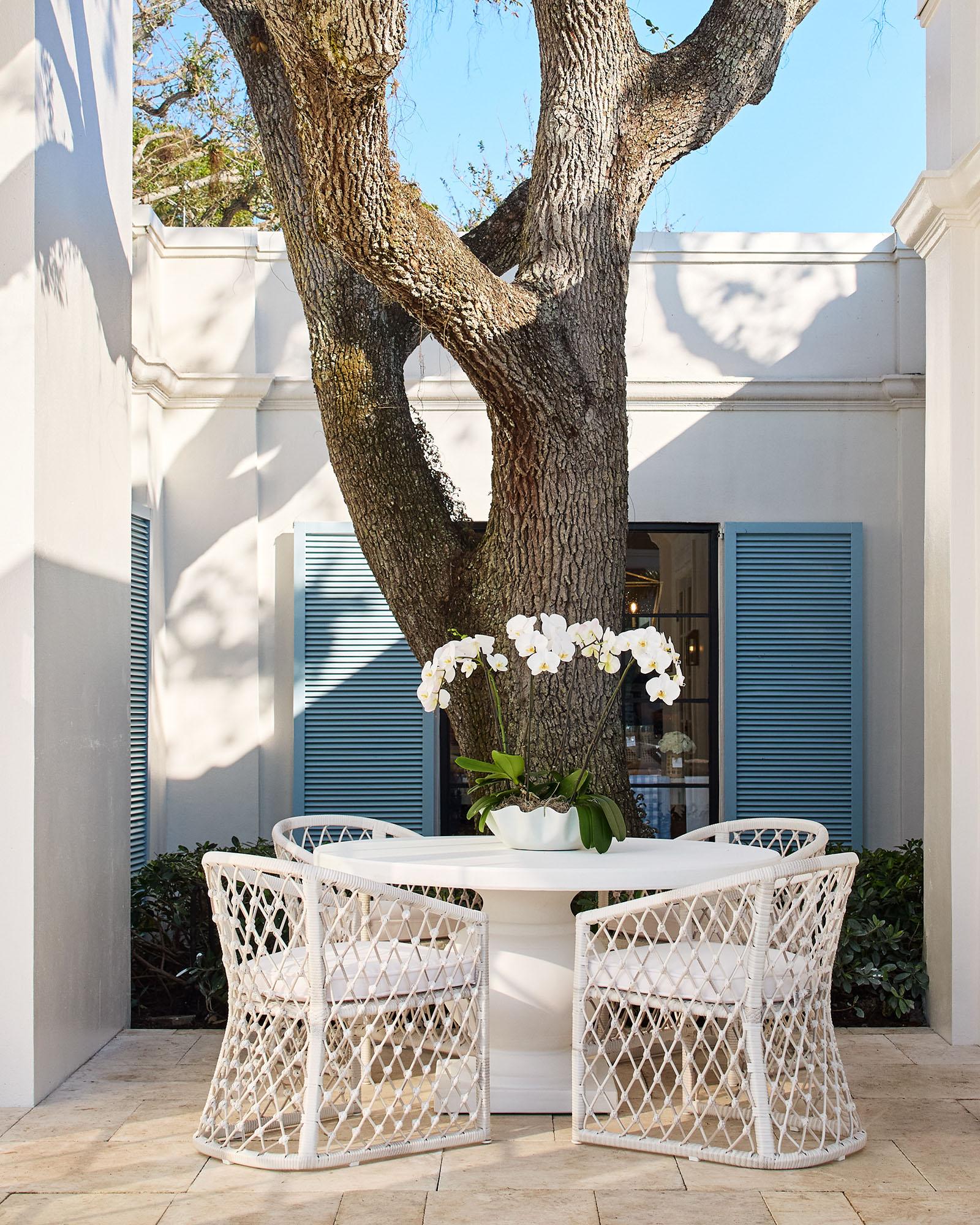 Terrace Round Dining Table and Capistrano Dining Chairs Set