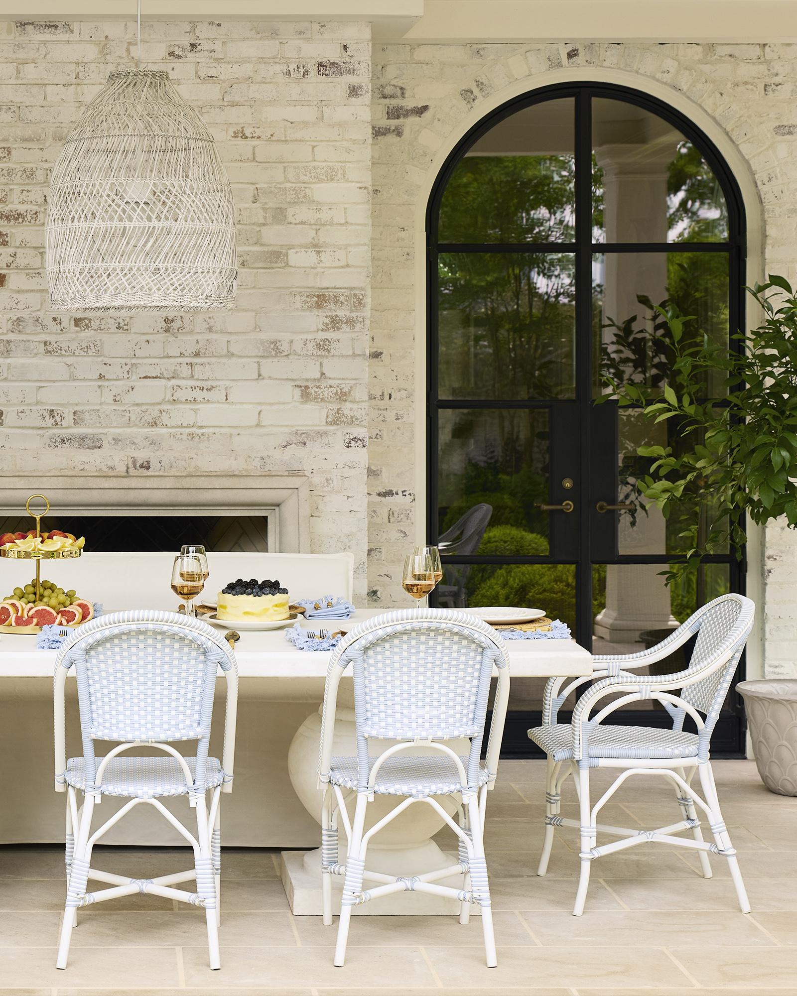 Outdoor-Dining-White-Stone-Table-Terrace-Blue-Riviera-Chairs-brand ...