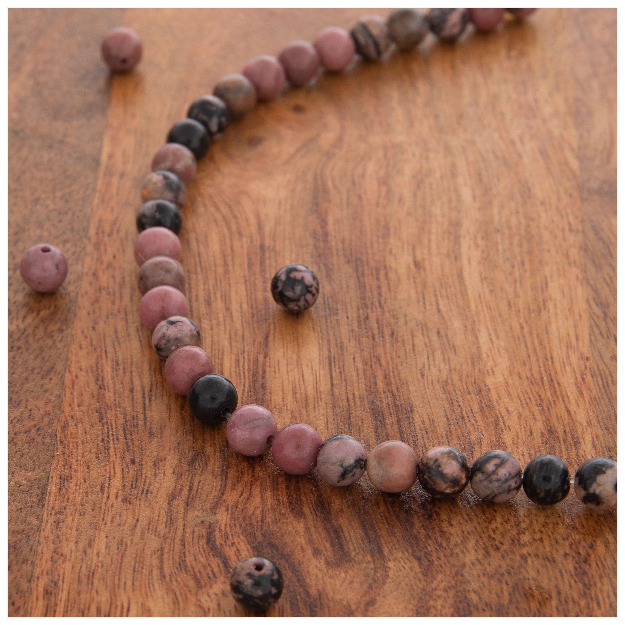 Pink & Black Rhodonite Round Bead Strand | Hobby Lobby | 1806918